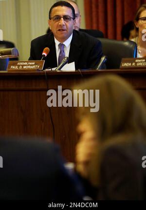 New Jersey Assemblyman Paul Moriarty speaks with his lawyer, John ...
