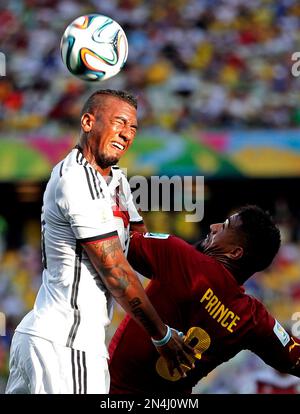 Ghana's Kevin-Prince Boateng, right, talks with teammate John Mensah as ...