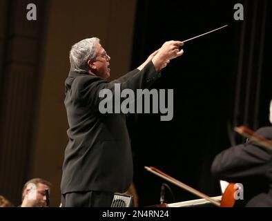 Mark Watters, composer and executive producer of the event, conducts 70 ...