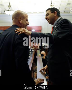 New Jersey Assemblyman Paul Moriarty speaks with his lawyer, John ...