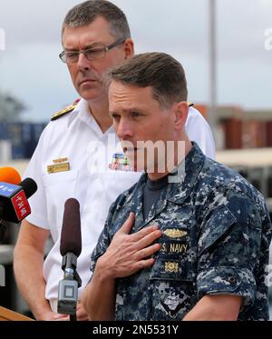 U.S. Navy captain Mark Matthews, right, Royal Australian Navy commodore ...