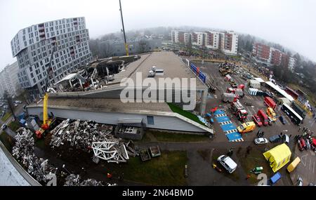 A view of collapsed Maxima supermarket in Riga, Latvia, Friday, Nov. 22 ...