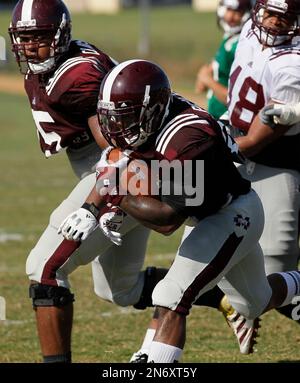 In this Aug. 10, 2013 photograph, Mississippi State quarterback Tyler ...