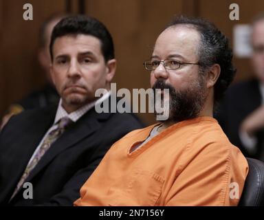 Ariel Castro, right, sits in the courtroom during the sentencing phase ...