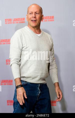 US actor Bruce Willis poses for photographers during a photocall to the ...