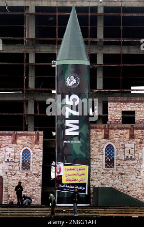 A large model of a M75 long range rocket is seen as thousands of Hamas ...