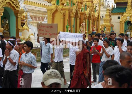 Myanmar's Rakhine ethnic people pray at Shwedagon pagoda on Saturday ...