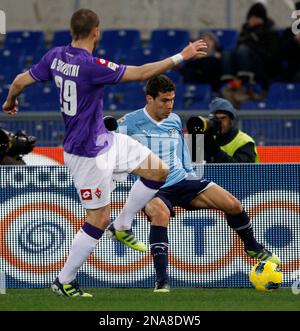 Lazio midfielder Hernanes, of Brazil, right, is challenged by Sampdoria ...