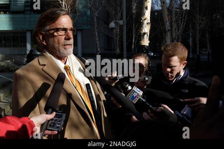 John Henry Browne, center, the attorney for Colton Harris-Moore, who is ...