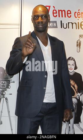French actor Omar Sy reacts after being awarded with the Best Actor ...