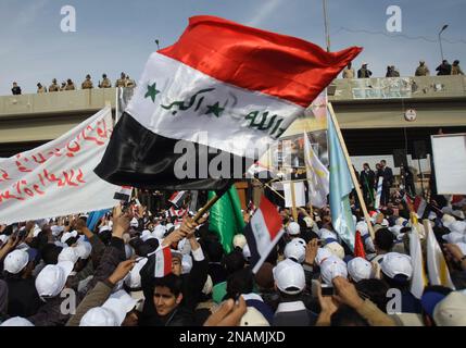 People chant anti-US slogans during a demonstration in Fallujah, 40 ...