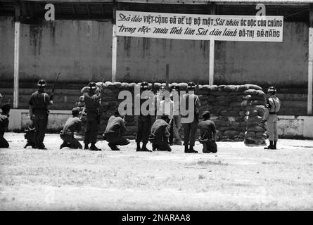 Viet Cong terrorist Le Dau, 24, is blindfolded as he is led to stake at which he was executed by ...