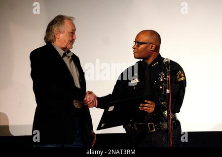 Dallas Police Chief David O. Brown, right, talks with Johnny Calvin ...