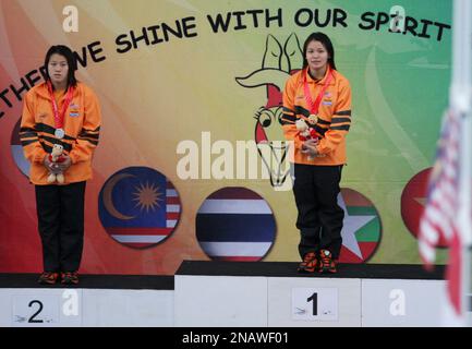 Malaysia's Ng Yan Yee, right, and Cheong Jun Hoong competes during the ...