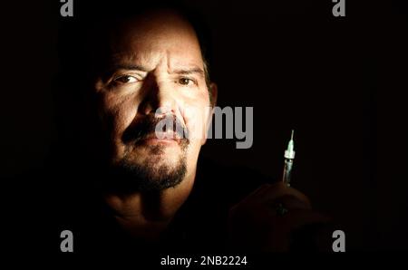 Dermatologist Arnold Klein poses for a portrait in his office in ...