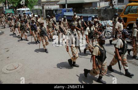 Pakistani paramilitary troops leave after a crackdown operation against ...