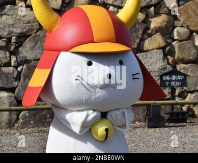 Hikonyan a mascot created by the Hikone City, appears in front of ...