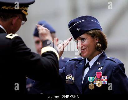 Air Force Brig. Gen. Gina M. Grosso, right, speaks during a news ...