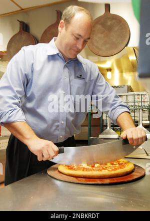 President of Miami-based Burger King, Steve Wiborg, in apron, with ...