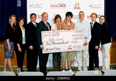 Tyler Leard, left, a junior at Wissahickon HS, poses for a photo with a ...