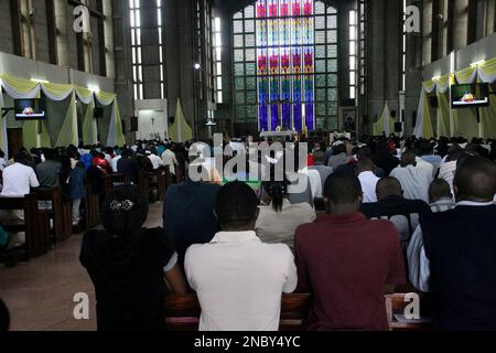 Kenyan Christian as they join morning service at Holy Family Basilica ...