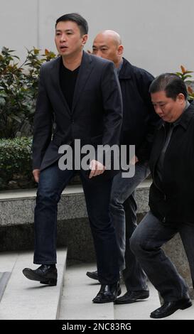 Philippine Rep. Ronald Singson, left, the son of Luis "Chavit" Singson ...