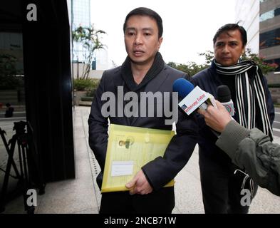 Philippine Rep. Ronald Singson, left, the son of Luis "Chavit" Singson ...