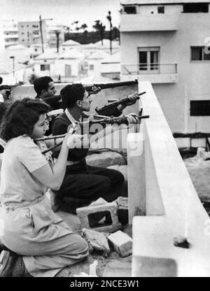 Members of the National Military Organization Irgun Zvai Leumi are ...