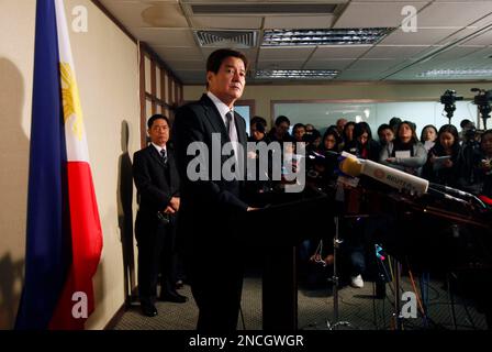 Philippine Tourism Secretary Alberto Lim, third from right, and Manila ...
