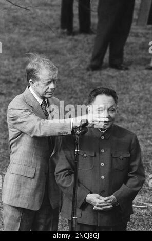Chinese Vice Premier Teng Hsiao-Ping applauds as he and President Jimmy ...