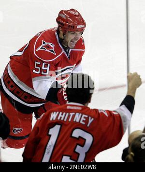 Carolina Hurricanes' Chad LaRose (59), Ryan Carter (29), and Joni ...