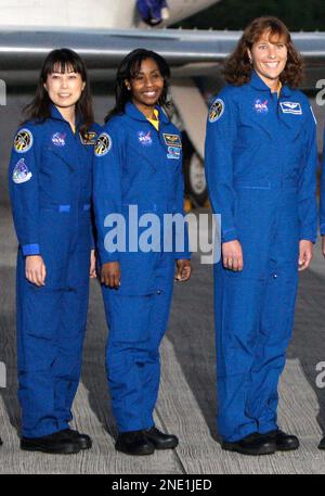 Three female astronauts of the space shuttle Discovery crew, from left ...