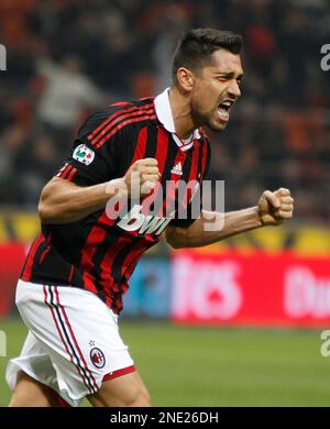 AC Milan forward Marco Borriello, unseen in the picture, celebrates ...