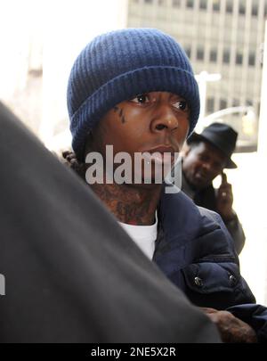 Rapper Lil Wayne enters Manhattan criminal court, Monday, March 8, 2010 ...