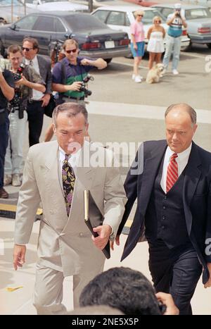 Los Angeles police Sgt. Stacey Koon reviews the report he is accused of ...