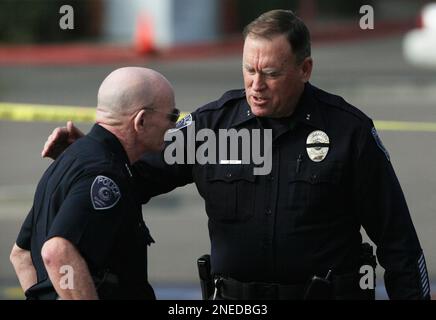 Gilbert Police Chief Tom Dorn leaves the podium after speaking at a ...