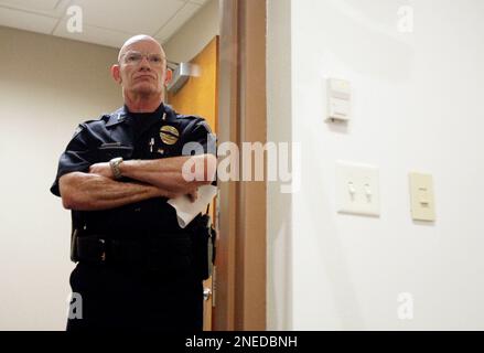Gilbert Police Chief Tom Dorn leaves the podium after speaking at a ...
