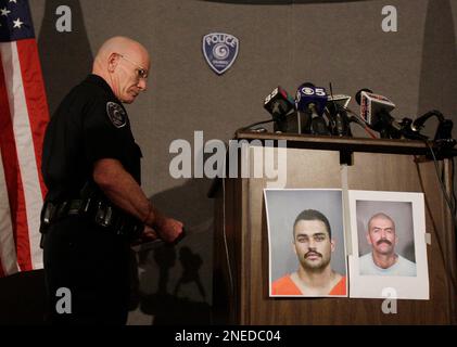 Gilbert Police Chief Tom Dorn leaves the podium after speaking at a ...