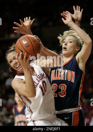 Oklahoma forward Carlee Roethlisberger, left, greets teammate Whitney ...