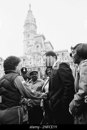 Democratic mayoral candidate W. Wilson Goode pauses to buy some fruit ...