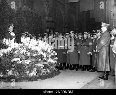 President of the Reichstag Hermann Goering, left, lifts his ...