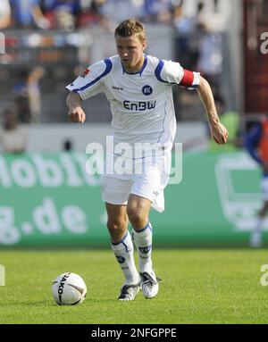 Karlsruhe's Maik Franz goes for the ball during the German first ...