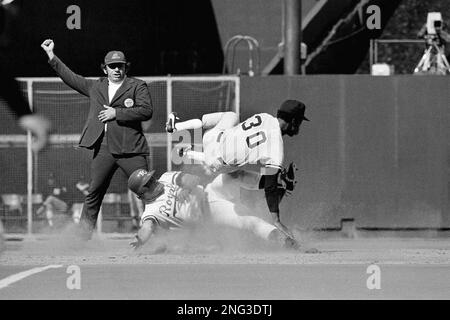 George Brett, Royals third sacker, comes up swinging at his Yankees ...