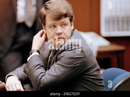 Los Angeles police officer Laurence Powell, right, and his attorney ...
