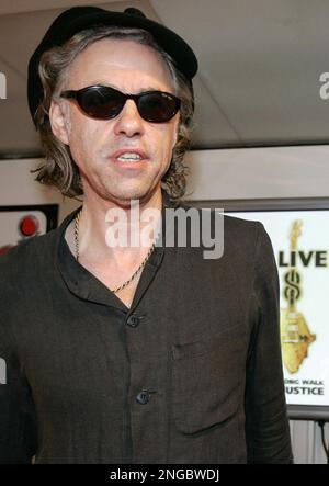 Rock star Bob Geldof speaks to reporters during a press conference in ...