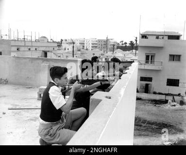 Members of the National Military Organization Irgun Zvai Leumi are ...