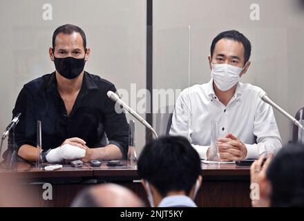 Vincent Fichot of France (C) attends a press conference after decision ...