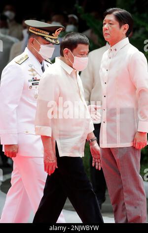 Incoming Philippine president Ferdinand Marcos Jr., left, and outgoing ...