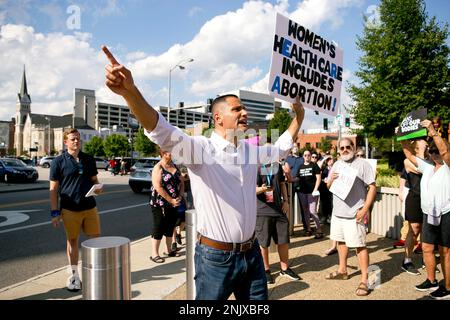 Del. Sam Rasoul, D-Roanoke, speaks to demonstrators advocating for a ...