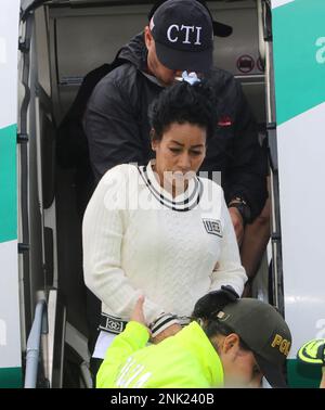 In this handout photo released by Colombia's Attorney General Press Office, police interview ...